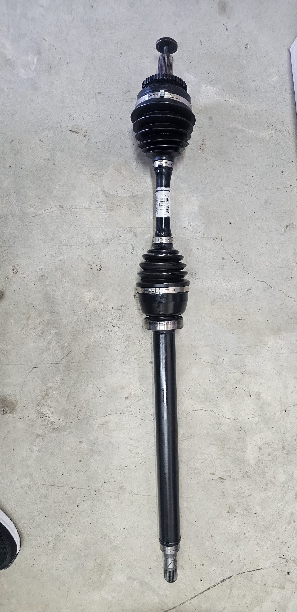 Manual transmission CV axle for a 1999 and 2000 Volvo S70 or V70 vehic ...